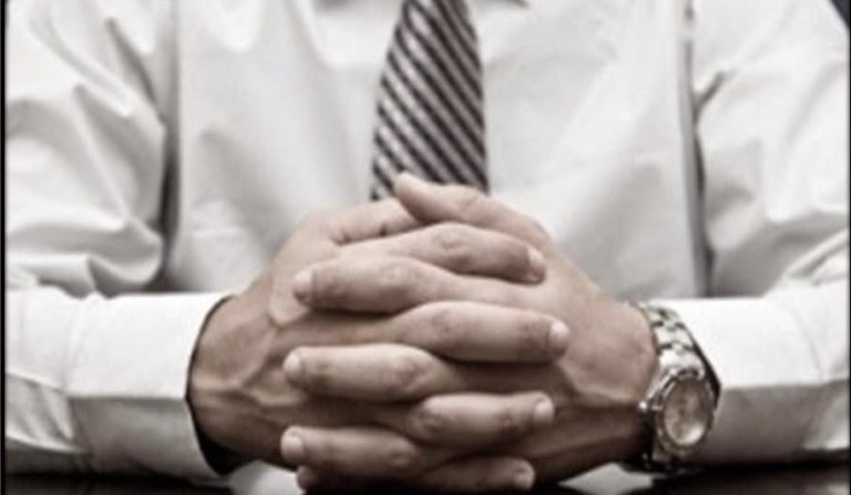 Body language: Hands clasped in front - PsychMechanics