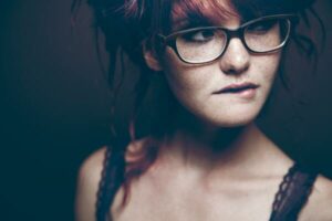 Biting lower lip meaning (Body language) - PsychMechanics